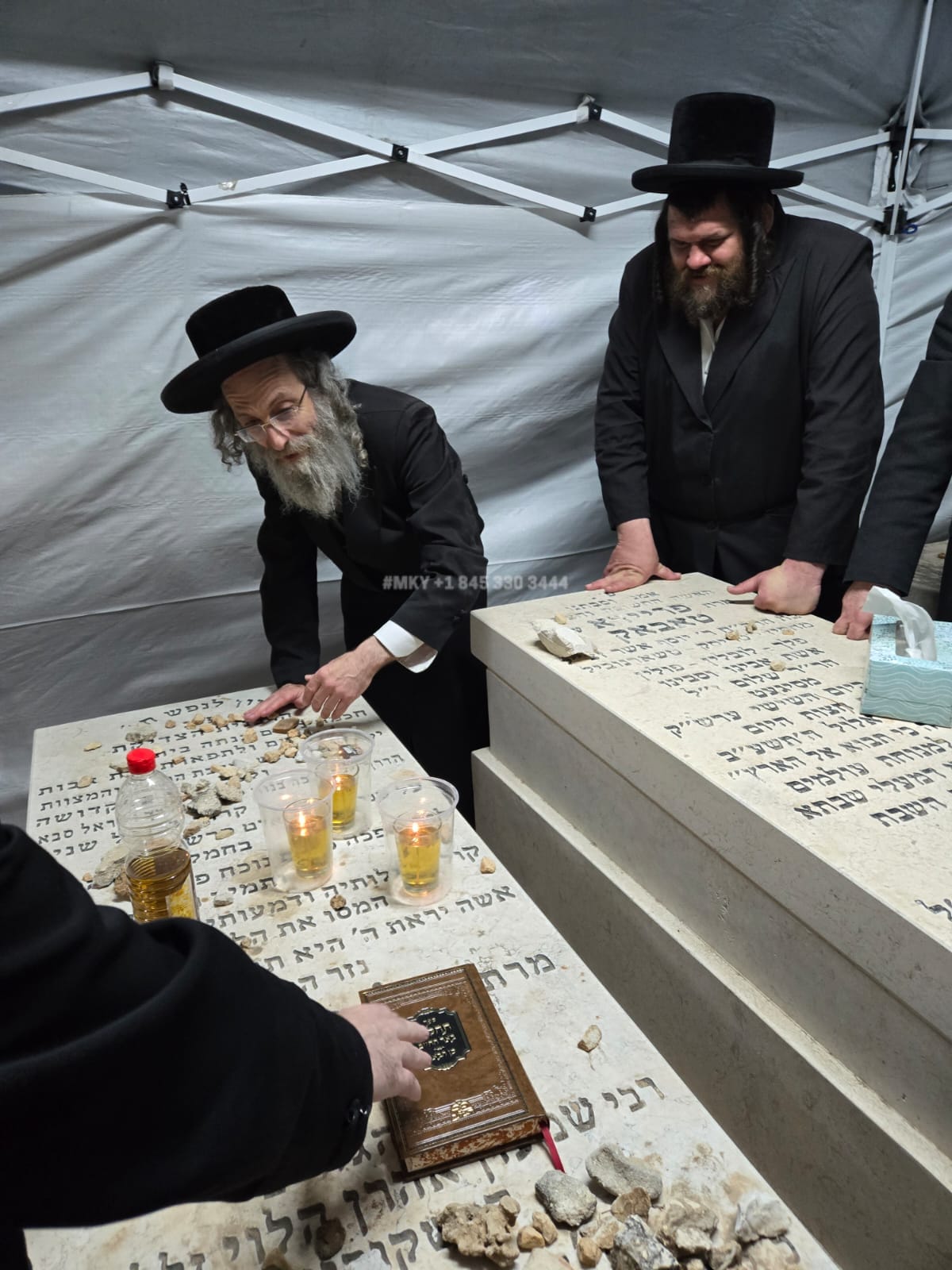 Reb Meilech at the kever of his mother, Rebbetzin Chaya Elka bas Reb ...